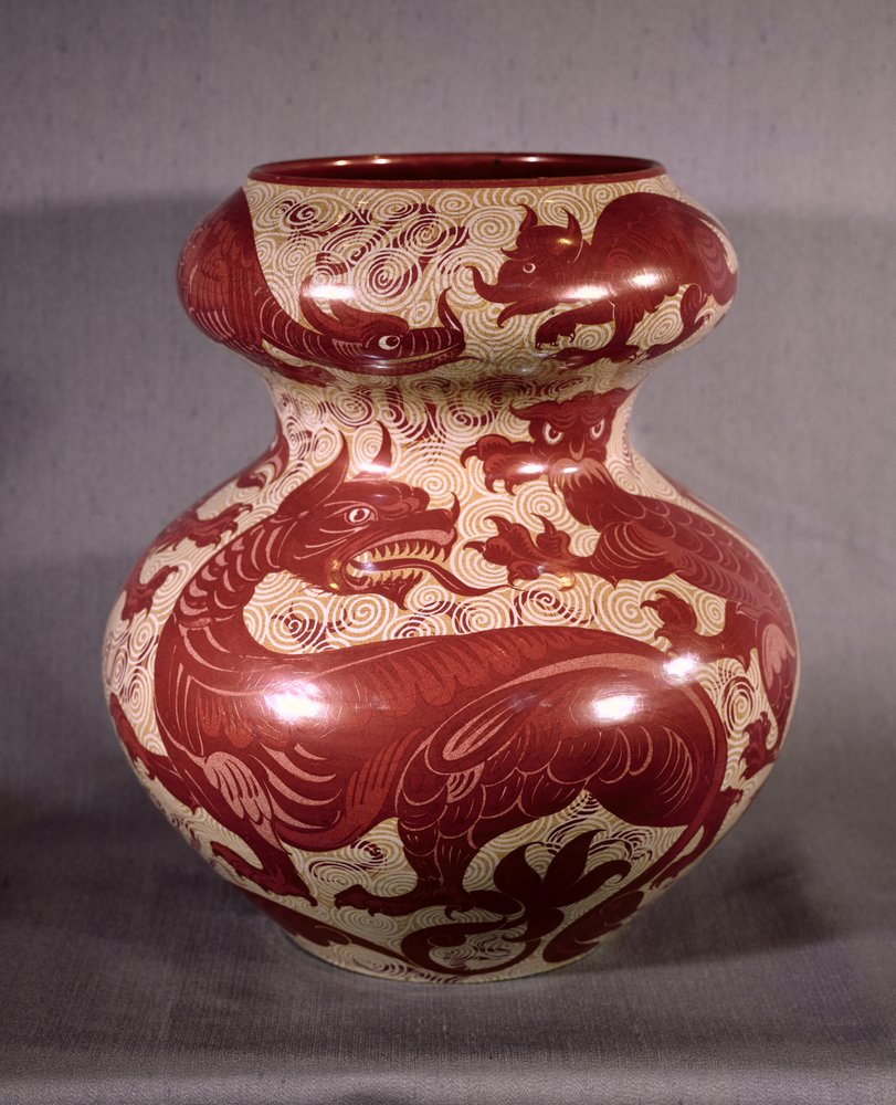 Vase decorated with a design of dragons in ruby red lustre on cream-coloured earthenware, late ...